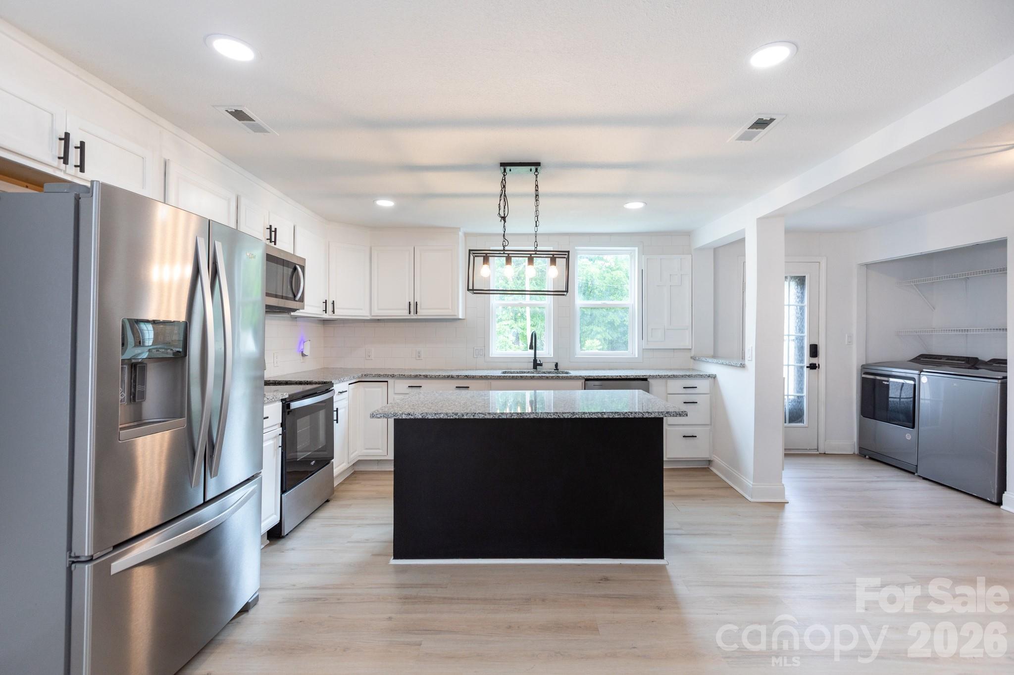 Photo 4 of 607 Old Charlotte Road SW, Concord, NC