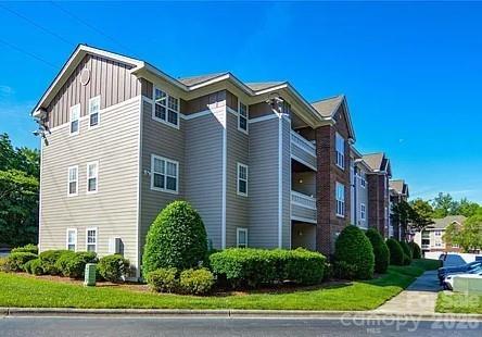 Home for sale at 9810 Campus Walk LaneH, Charlotte, NC — photo 1 of 24