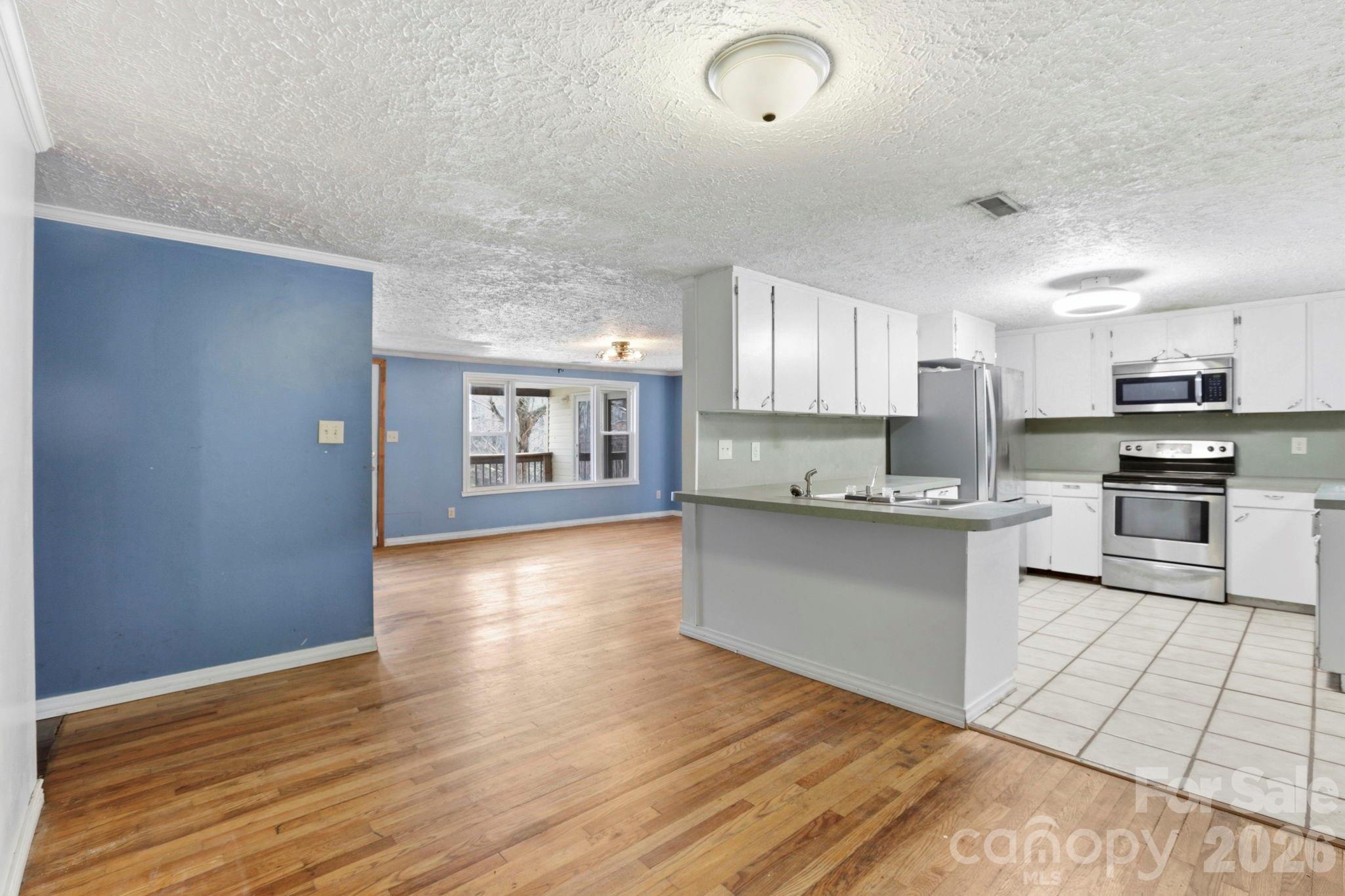 180 Whispering Pines Drive, Pisgah Forest, NC - photo 6 of 27