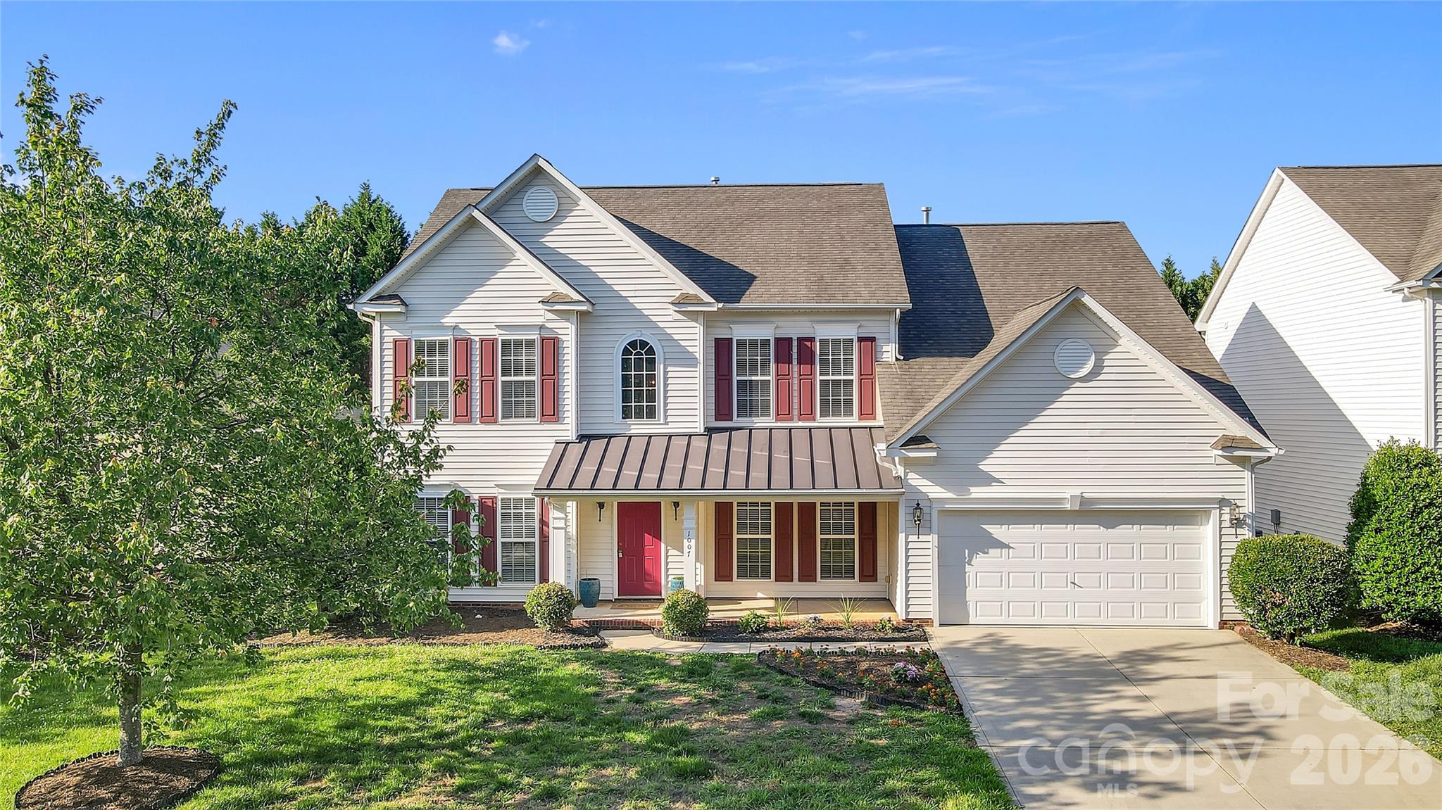 Photo 2 of 1007 Butterburr Drive, Matthews, NC