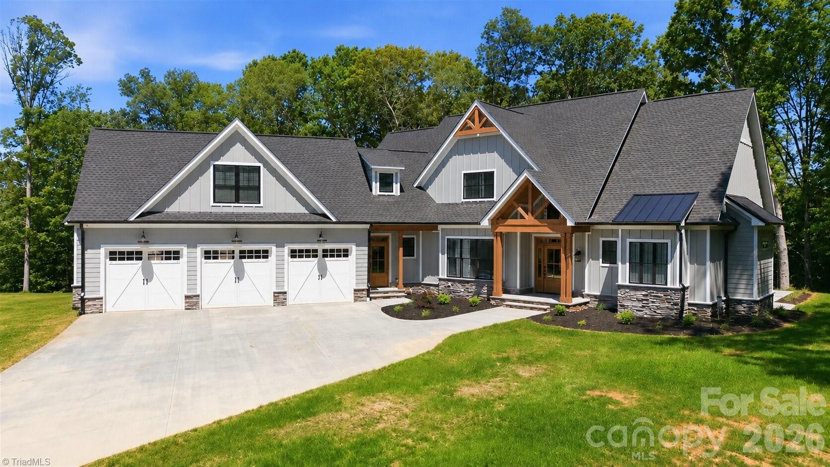 7566 Whisper Hollow Lane, Lewisville, NC - photo 1 of 49