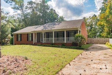 Home for sale at 7115 Powder Mill Place, Charlotte, NC — photo 1 of 21