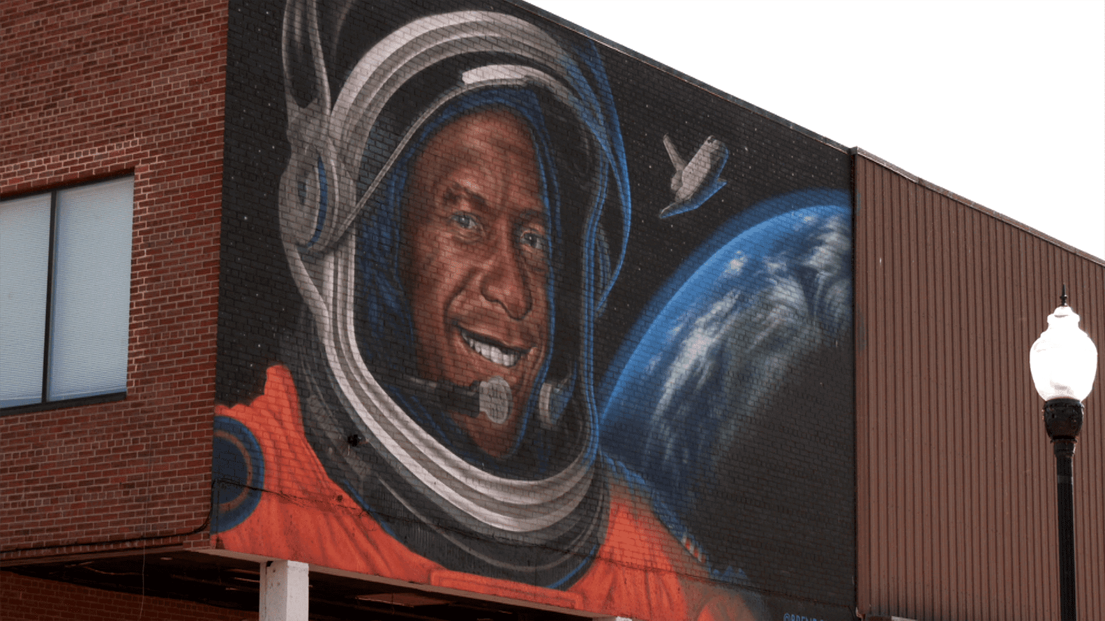 Astronaut Michael Anderson mural brightens Plattsburgh with a smile ...