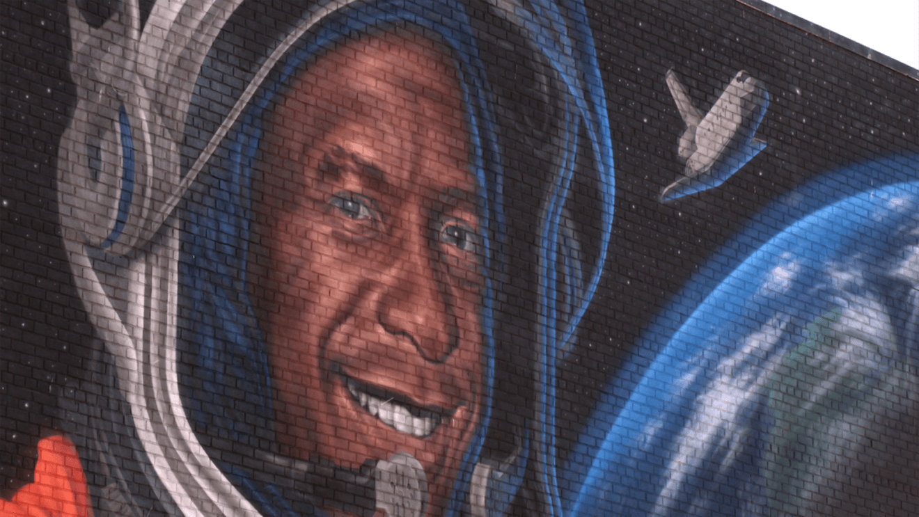 Astronaut Michael Anderson mural brightens Plattsburgh with a smile ...