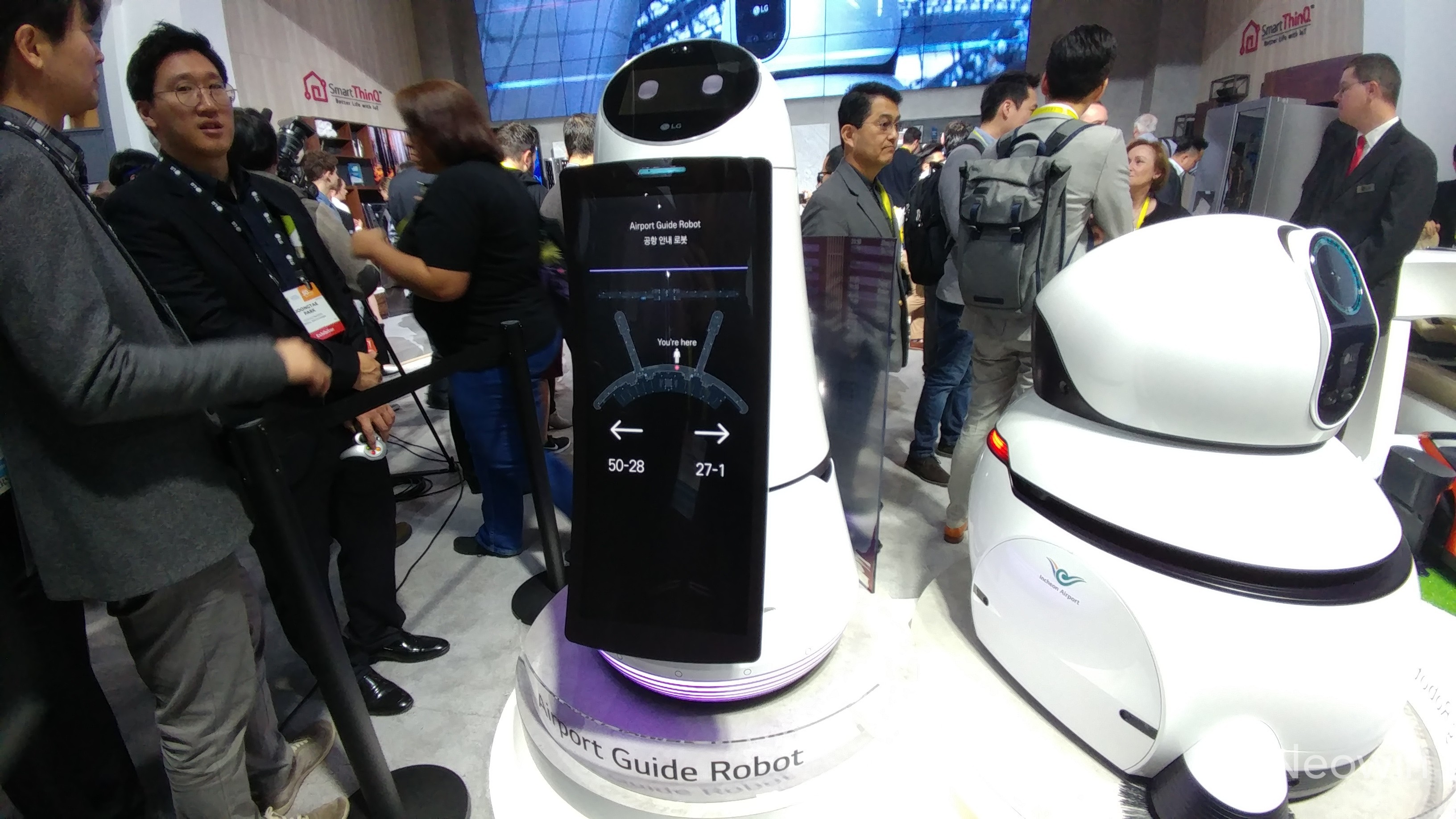 CES 2017: LG's booth has super-thin TVs, robots, a tunnel of 4K TVs ...