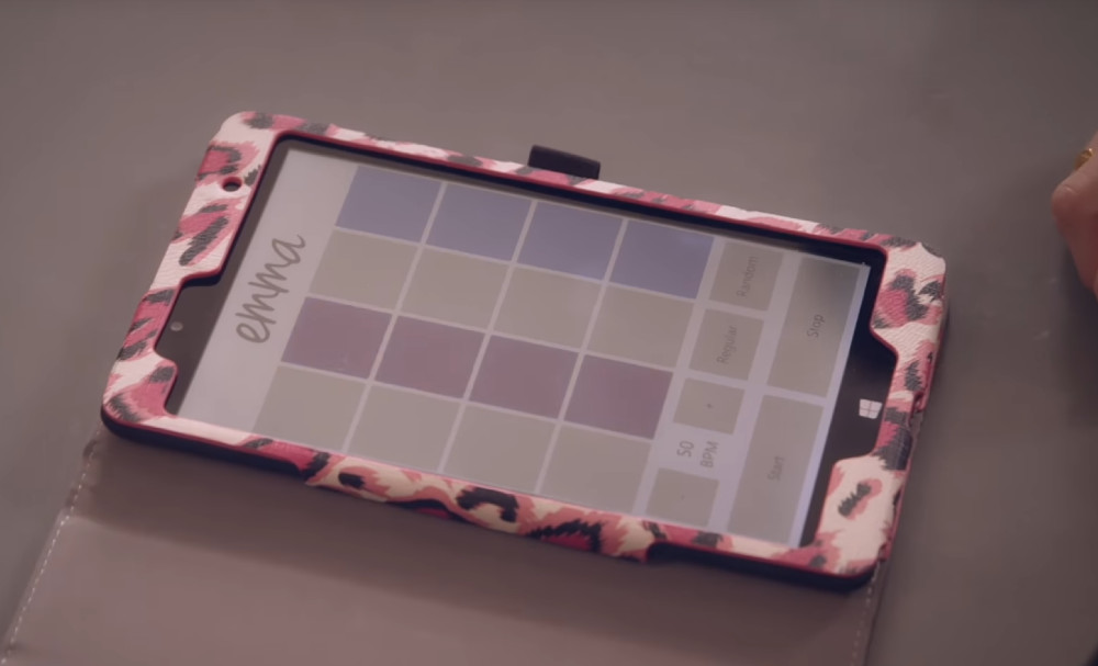 Experimental Microsoft wearable helps woman with hand tremors caused by ...