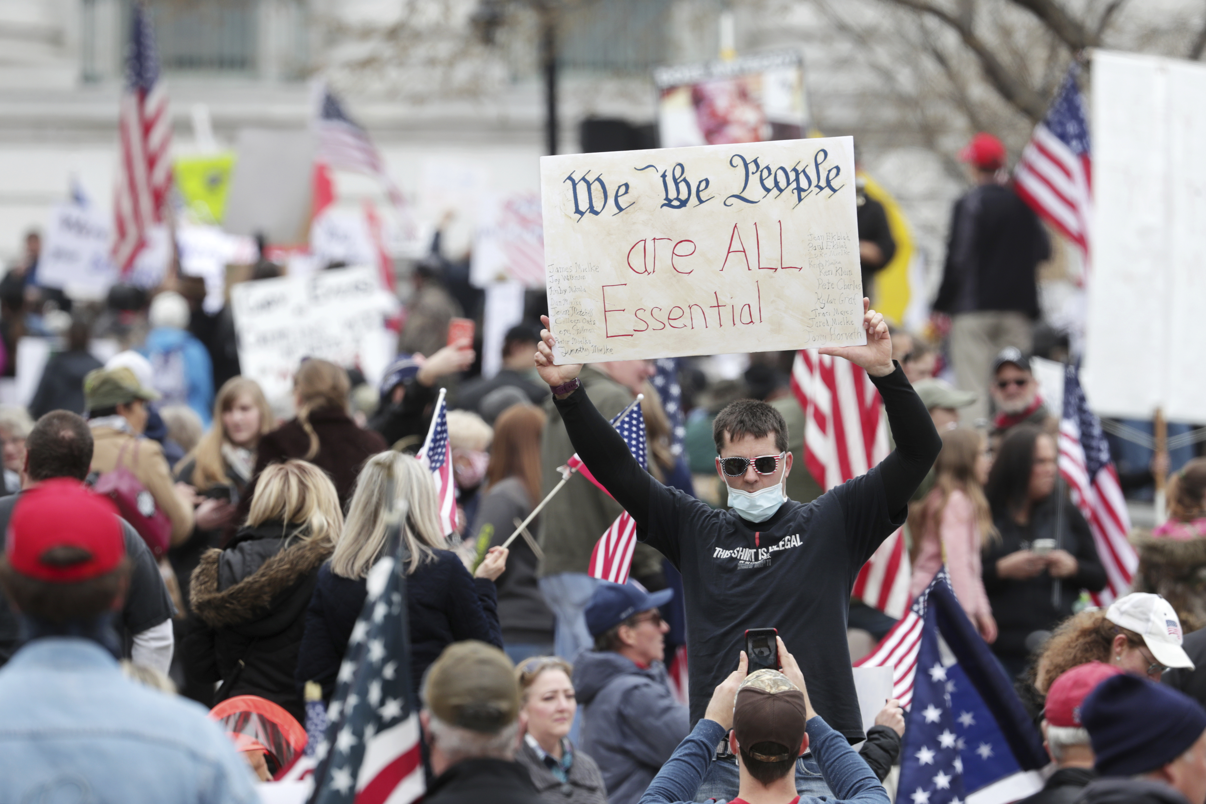 On the fence: As hundreds protest Wisconsin restrictions, some in GOP ...