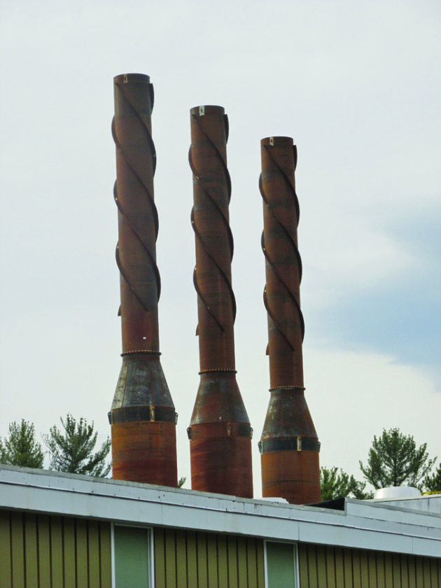 Energy center: Rust-colored smoke stacks to stay, for now at developing ...