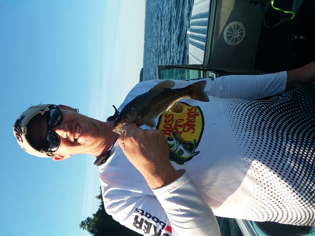 Caught a small mouth bass on Lake Champlain using a yellow spinnerbait