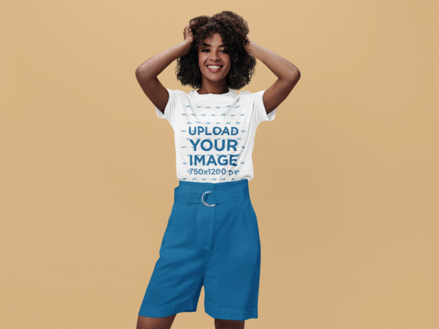 Placeit - Heathered Tee Mockup of a Woman with Curly Hair Posing in a ...