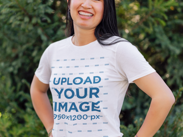 Placeit - T-Shirt Mockup of a Happy Woman Posing With Her Hands on Her ...