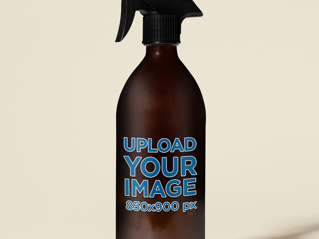 Placeit - Mockup of a Glass Spray Bottle in a Studio