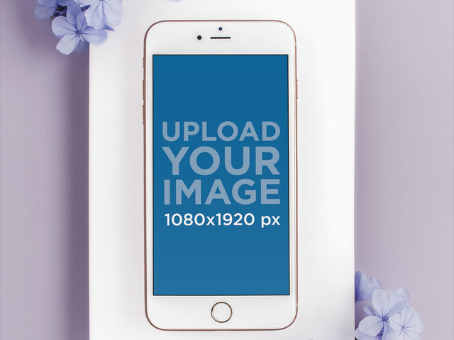 Placeit - Mockup of an iPhone Lying on a Surface Decorated with Hydrangeas