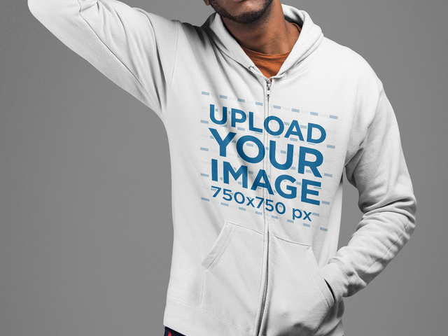 Placeit - Mockup of a Man Wearing a Full Zip Hoodie in a Studio