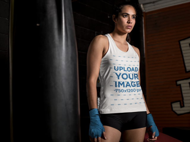 Placeit - Tank Top Mockup of a Female MMA Fighter Standing by a ...