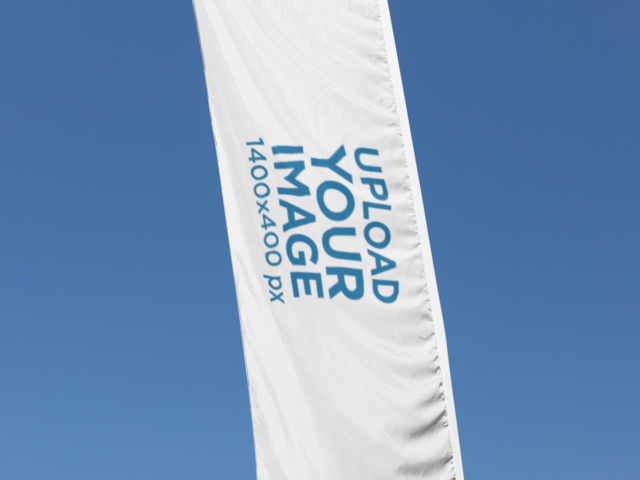 Placeit - Flag Banner Mockup on a Blue Sky Background