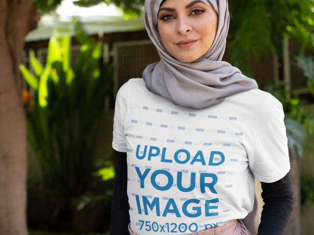 Placeit - T-Shirt Mockup of a Woman Wearing a Hijab at the Park
