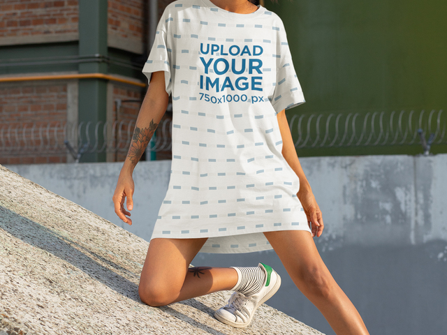 Placeit - Shift Dress Mockup Featuring a Woman Posing on a Concrete ...