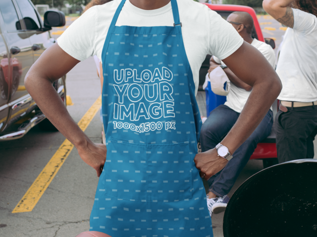 Placeit - Mockup of a Man Wearing an Apron at a Tailgate Party