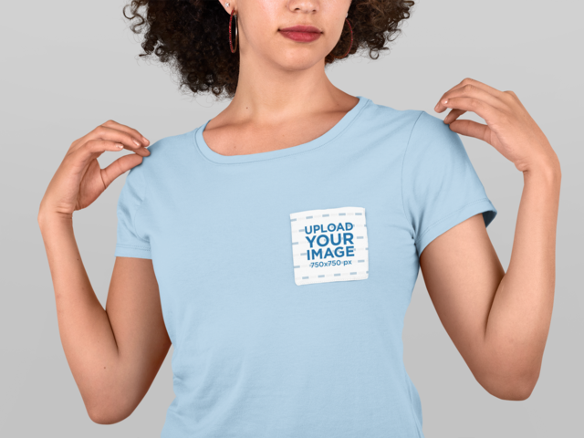 Placeit - Cropped Face Pocket Tee Mockup of a Woman with Curly Hair