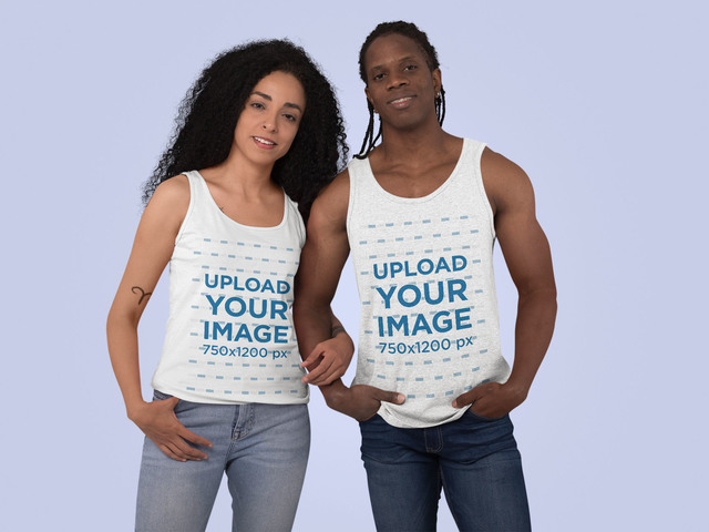 Placeit - Mockup of a Smiling Couple Wearing Tank Tops in a Studio