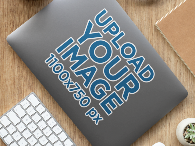 Placeit - Sticker Mockup Featuring a Laptop on a Wooden Desk