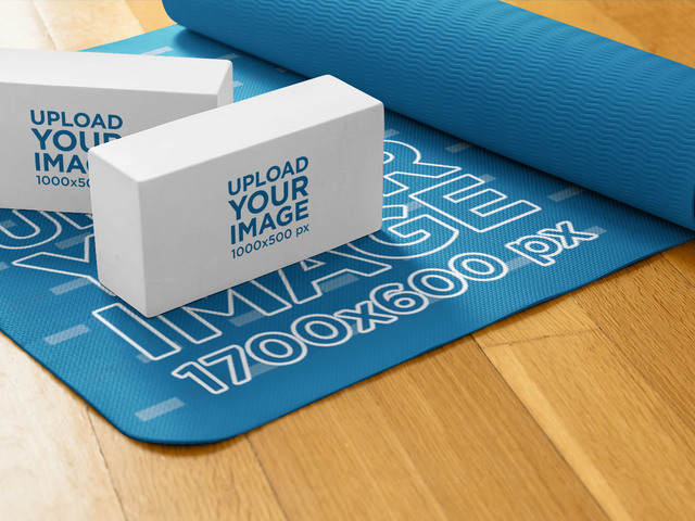 Placeit - Mockup of Two Yoga Blocks over an Exercise Mat