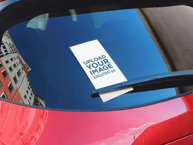 Placeit - Mockup of a Vertical Flyer on the Back Window of a Car