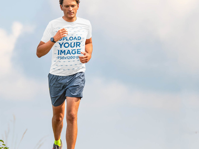 Placeit - T-Shirt Mockup of a Male Runner Training Outdoors