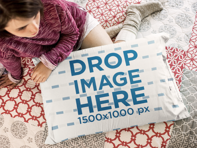 Placeit - Top Shot of a Young Woman Holding a Pillow While Sitting Down ...