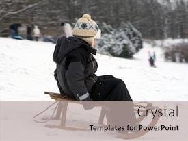 Child Sledding Winter Fun PPT template 71 | CrystalGraphics