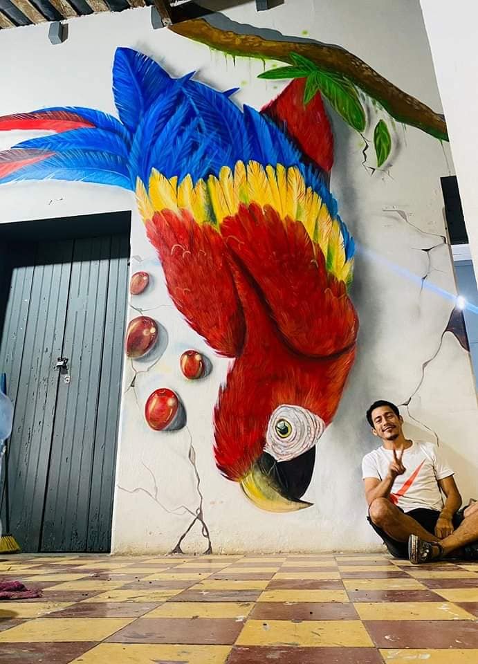 Hondureño crea mural 3D de una guacamaya en Copán
