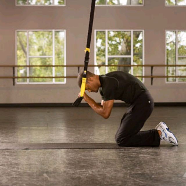TRX Front Rollout - Exercise How-to - Workout Trainer by Skimble