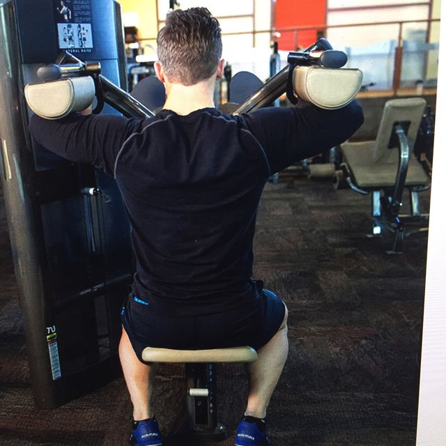 Machine Lateral Raises - Exercise How-to - Workout Trainer by Skimble