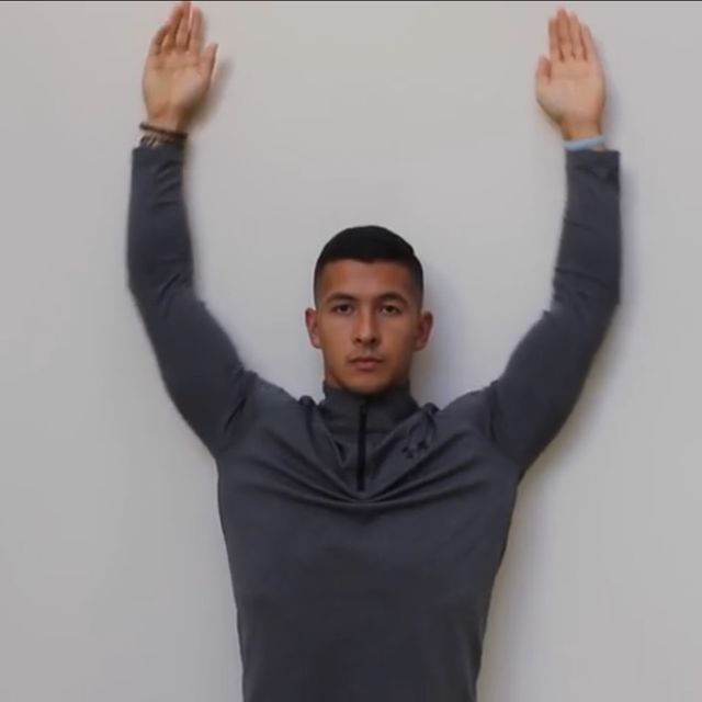 Wall Slides por Boo Gabunada - Ejercicio Cómo hacerlo - Skimble