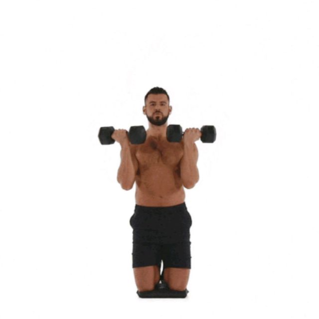 Dumbbell Kneeling Overhead Press - Exercise How-to - Workout Trainer by ...