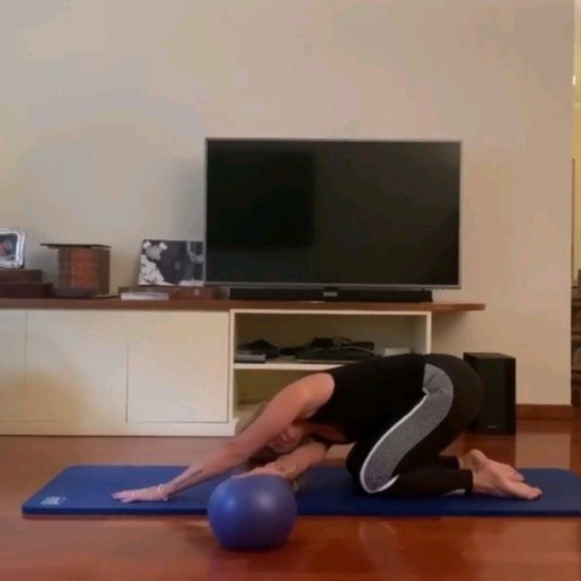 Roll the ball at hand in one direction and the other by Tanya P ...