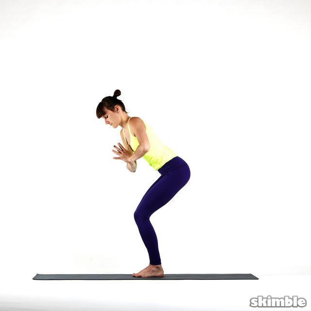 Twisting Chair Pose - Exercise How-to - Skimble Workout Trainer
