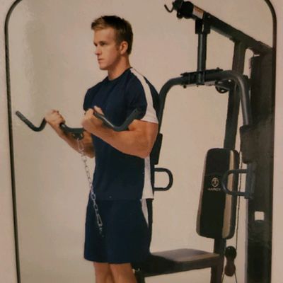 Seated Bicep Curl - Exercise How-to - Workout Trainer by Skimble