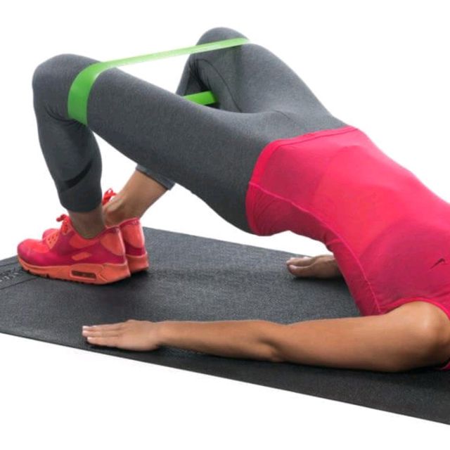 Bridge with resistance band - Exercise How-to - Workout Trainer by Skimble
