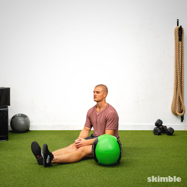 Modified Weighted Russian Twists - 锻炼方法 - Skimble Workout Trainer