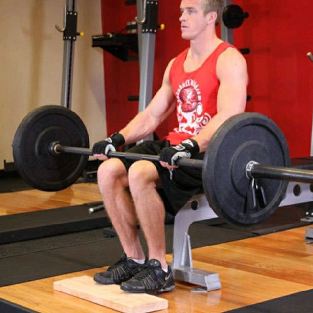 Barbell Seated Calf Raise by Martel Berry - Exercise How-to - Skimble