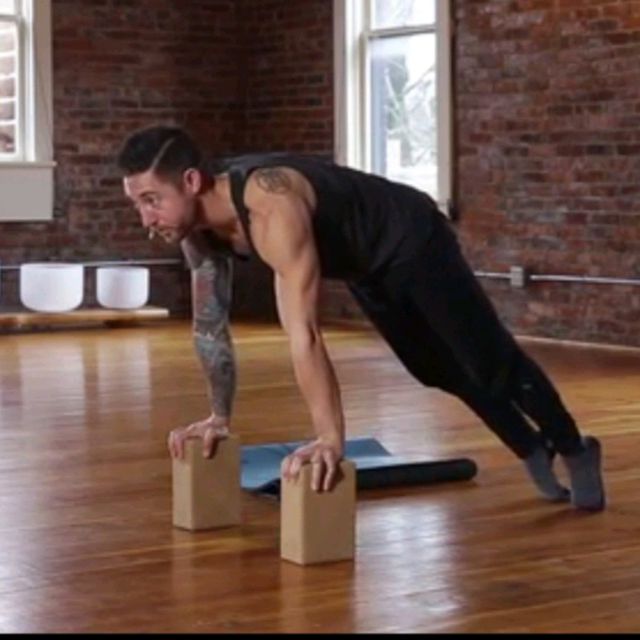 Sliding From Plank With Hands On Blocks To Draw Knees Into Chest ...