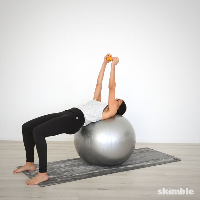 Ball Torso Rotations - Exercise How-to - Skimble Workout Trainer