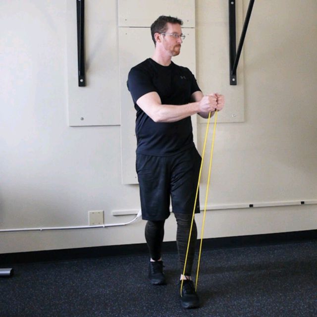 Torso Twist - Standing Band - Exercise How-to - Workout Trainer by Skimble