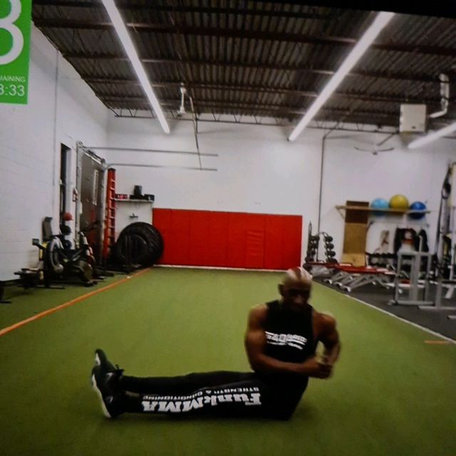 Sit Up With Twist by Yong Siong H. - Exercise How-to - Skimble