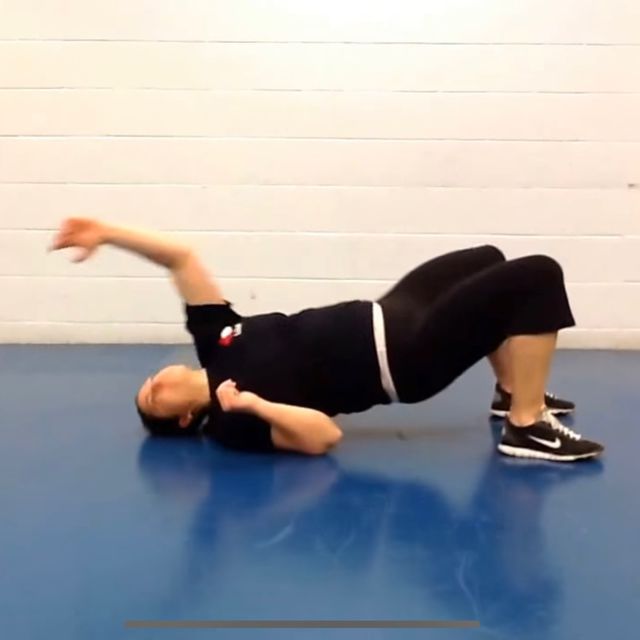 Supine Bridge with Reach and Roll - Exercise How-to - Workout Trainer ...