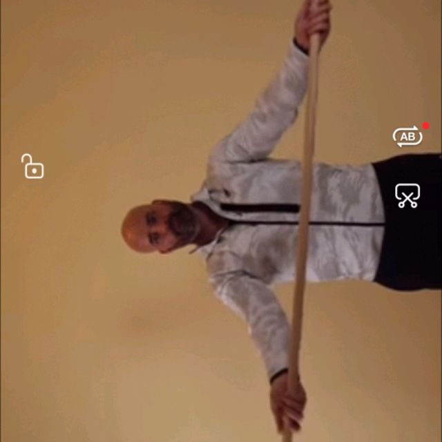 Stick Rotation Back Strech by Chan Y. - Exercise How-to - Skimble