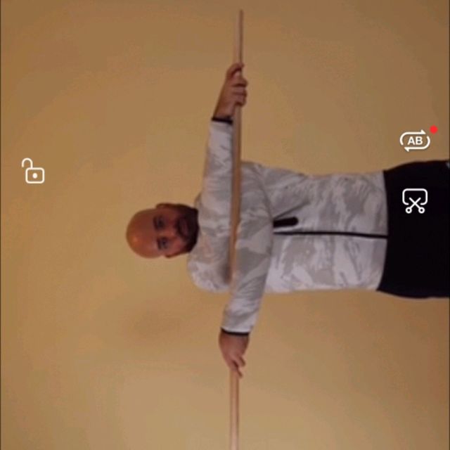 Stick Rotation Back Strech by Chan Y. - Exercise How-to - Skimble