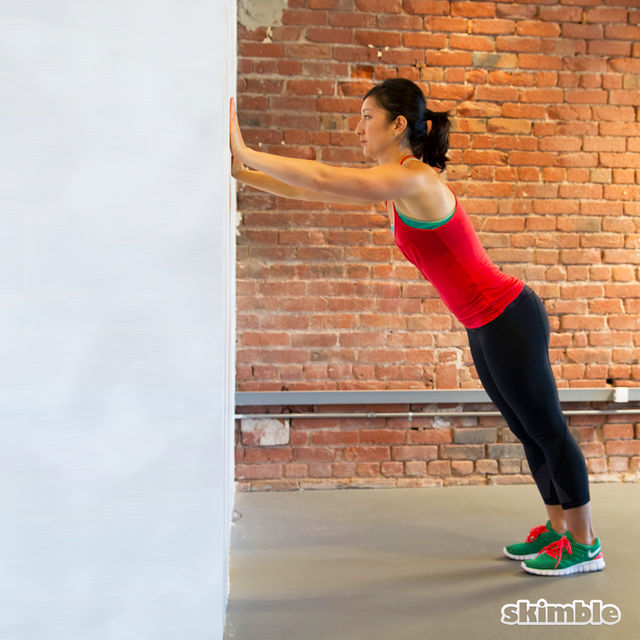 Wall Hamstring Stretches - Exercise How-to - Workout Trainer by Skimble